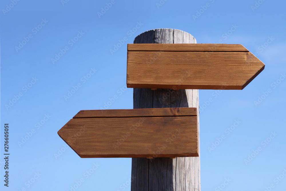 empty wooden signpost with two arrows pointing left and right, mocap ...