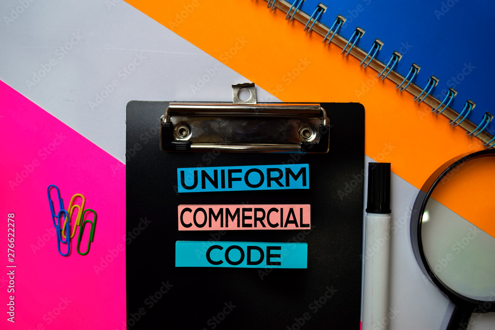 Uniform Commercial Code (UCC) text on sticky notes with color office ...