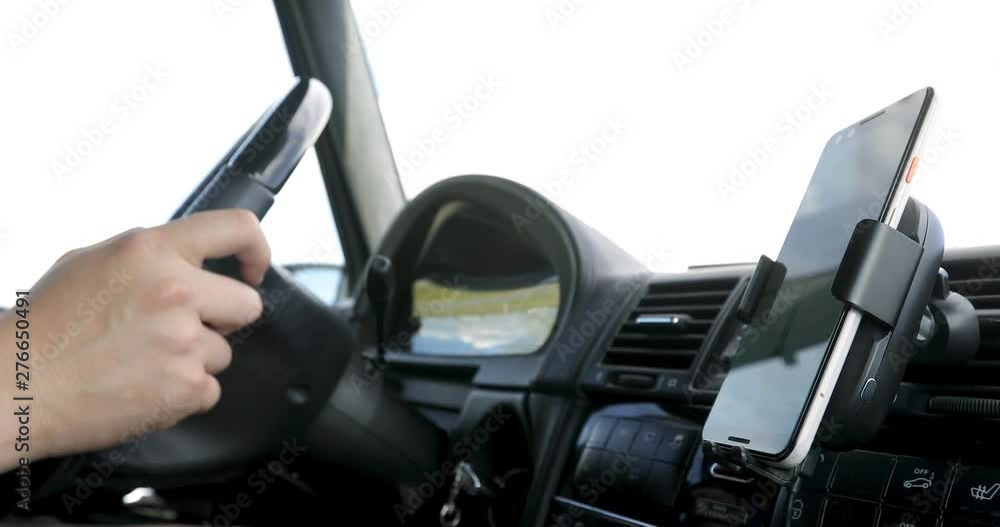 Vidéo Stock Crop person driving car holding hands on steering wheel ...