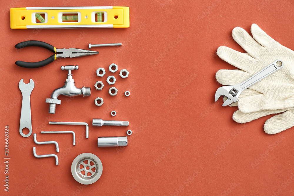 Set of plumbing tools and items on color background Stock Photo | Adobe ...
