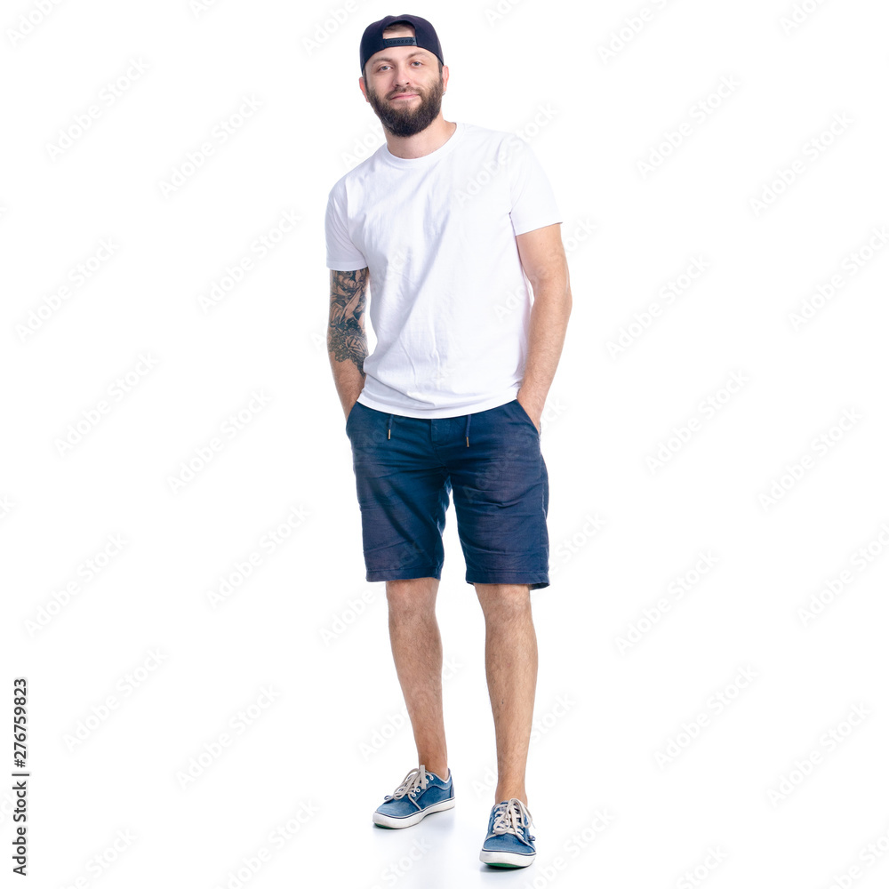 Man in shorts and cap standing happiness smiling on white background ...