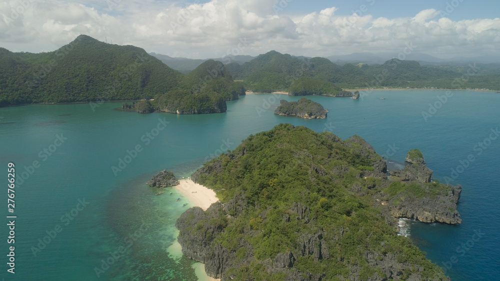 Aerial view of islands with sand beach and turquoise water in blue ...