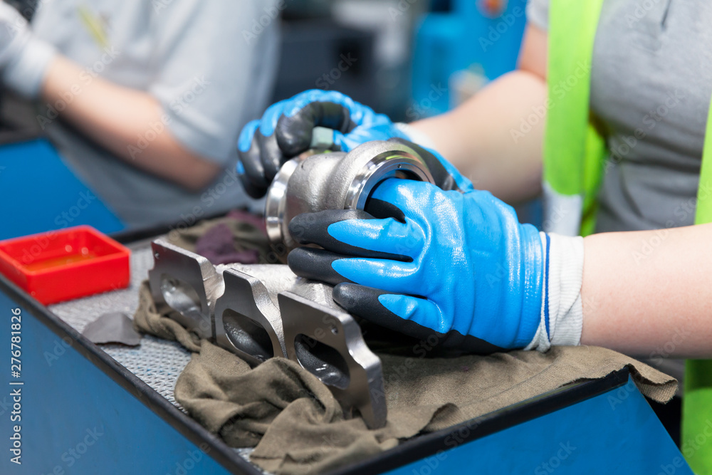 Manual work in the automotive industry Stock Photo | Adobe Stock
