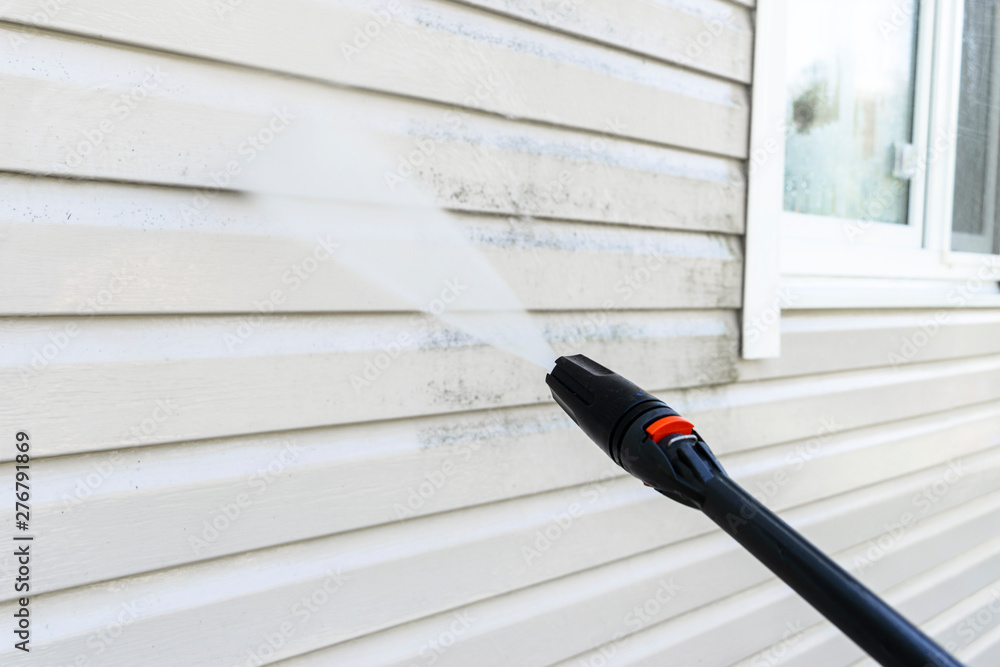 Cleaning service washing building facade with pressure water. Cleaning ...