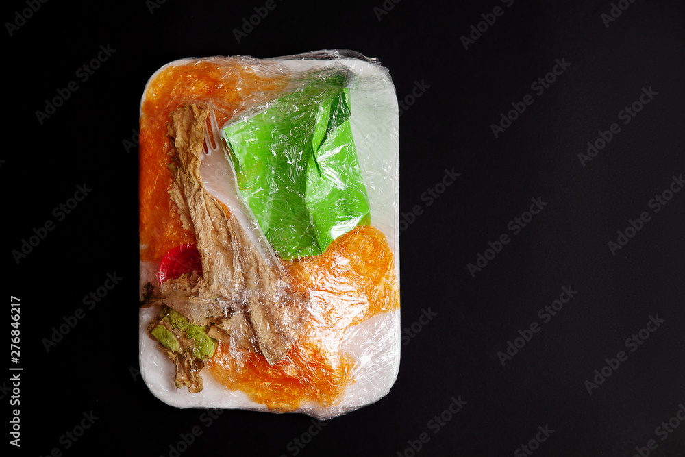 Still life cocnept of food plastic pollution. Creative poster for ban ...