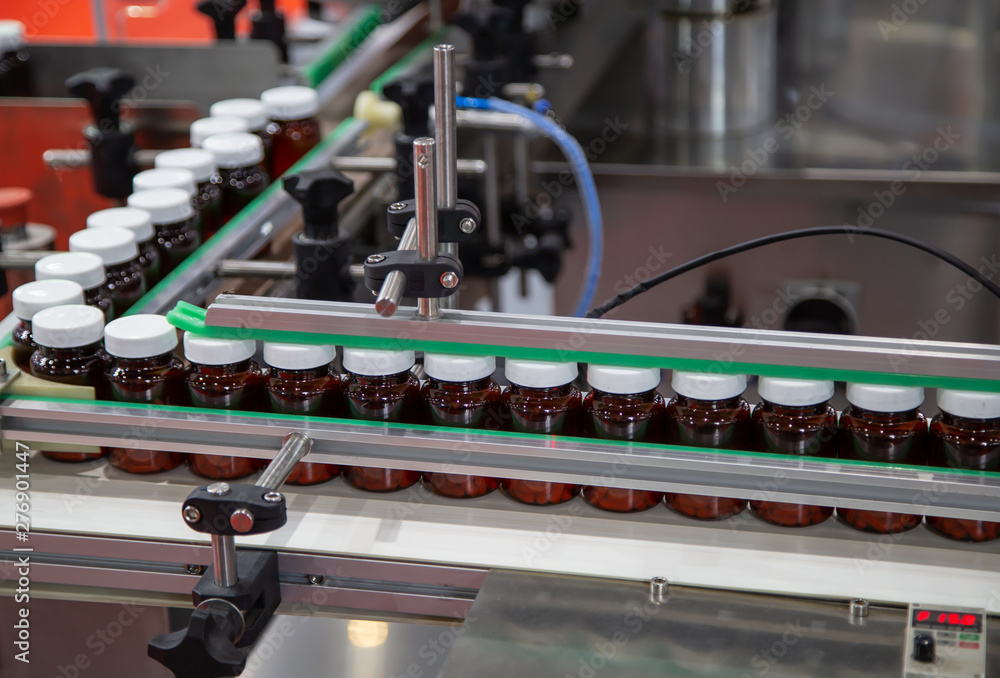 Industrial pharmaceutical process of capsule filling in bottle and ...