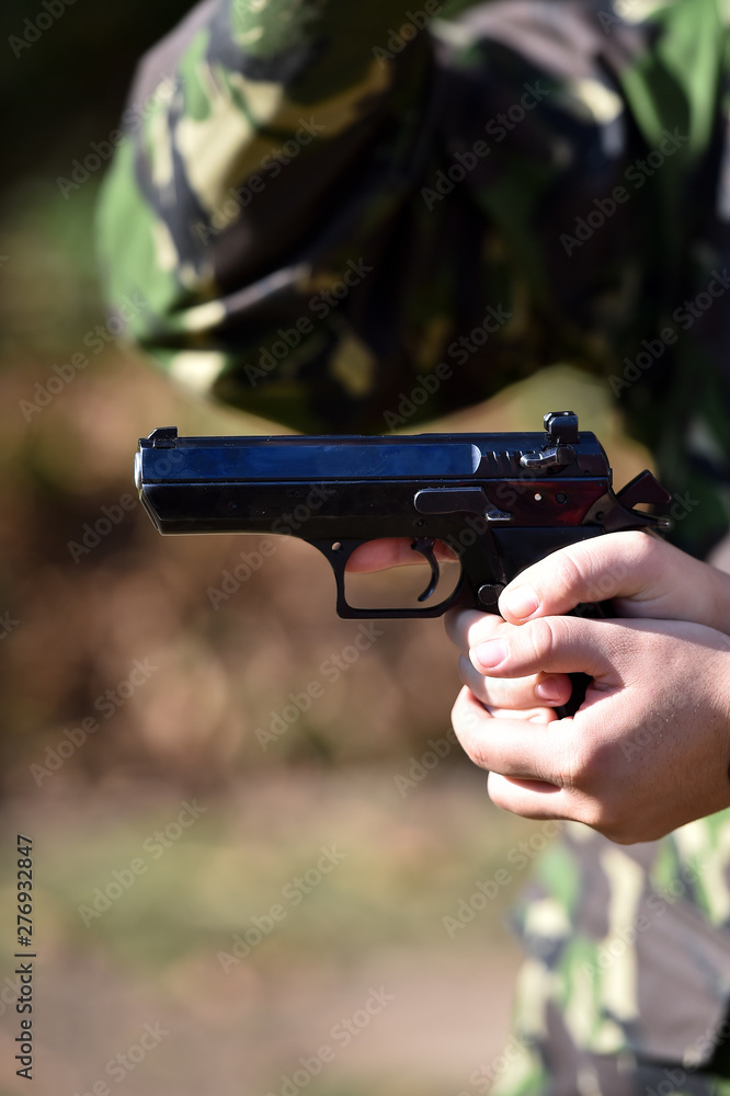 Outdoor target shooting with a 9mm pistol in a shooting range Stock ...