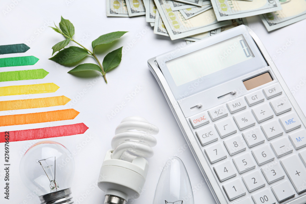 Composition with energy efficiency rating chart, light bulbs and ...