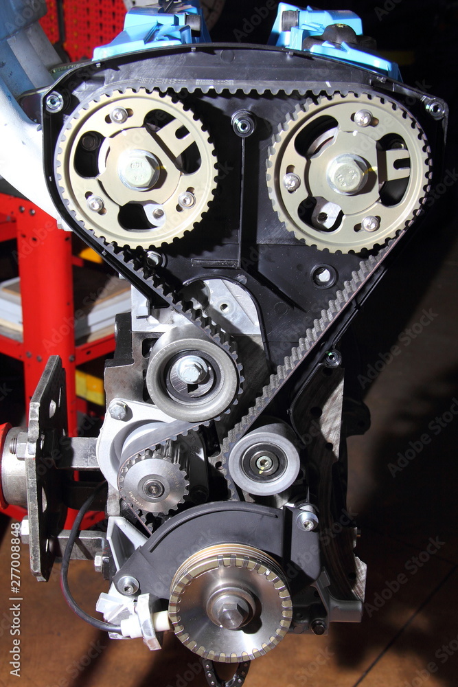 Distribution belt of an endothermic engine with the passages around the ...