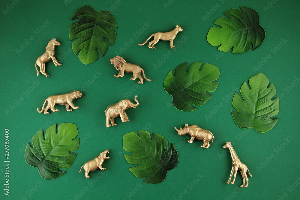 Abstract green background with tropical leaves and exotic animals Stock ...