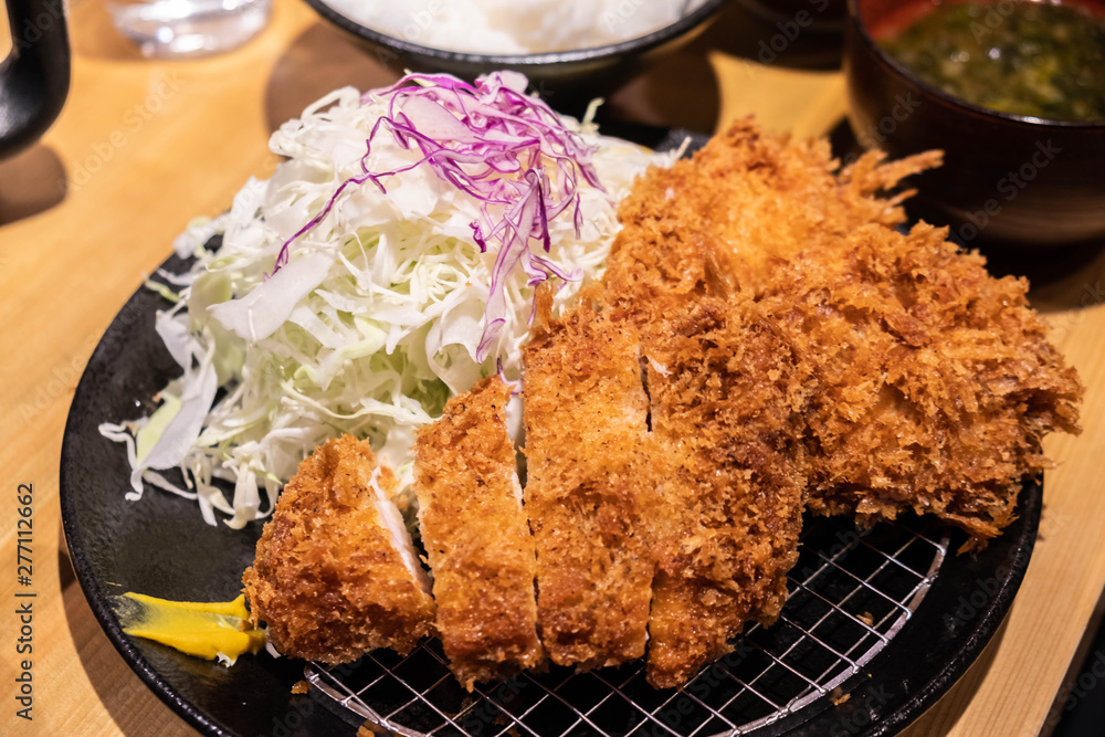 Deep fried pork cutlet with white cabbage salad. Traditional japanese ...