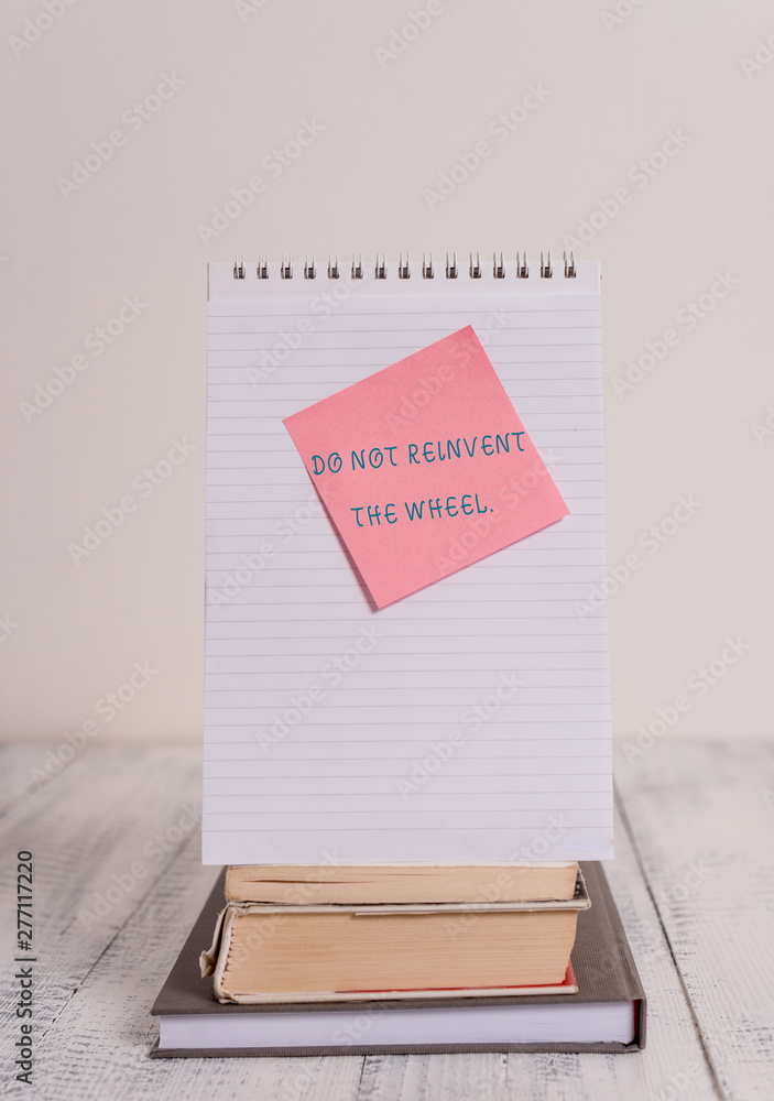 Writing note showing Do Not Reinvent The Wheel. Business concept for ...