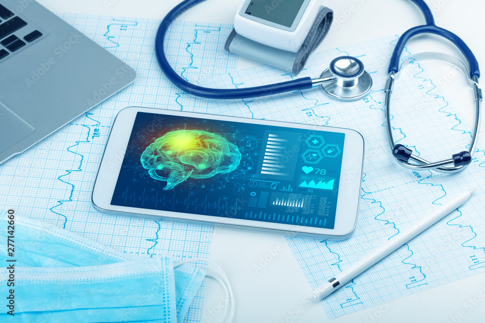 Brain functionality report with medical devices around Stock Photo ...