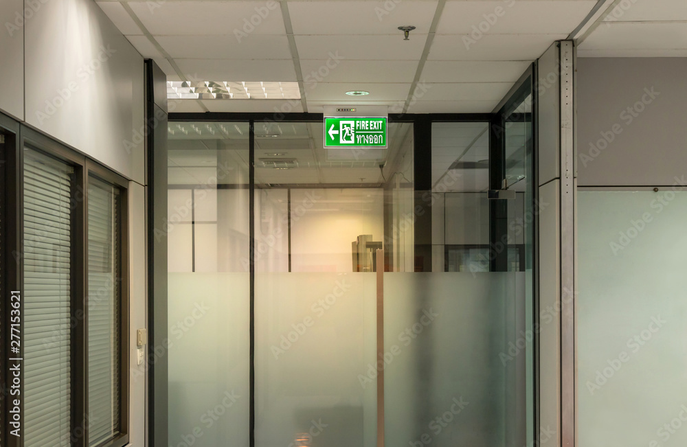 green emergency exit sign to install over the door building ...