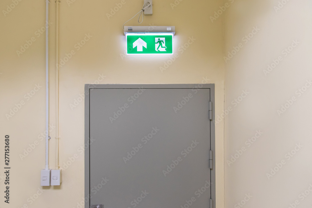 green emergency exit sign to install over the door building ...