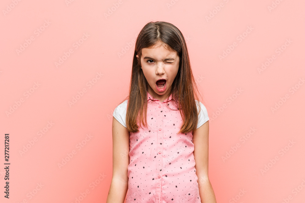 Cute little girl screaming very angry and aggressive. Stock Photo ...