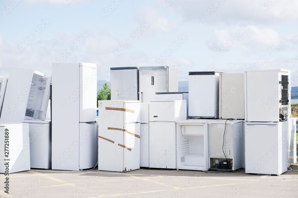 Foto de Old fridges freezers refrigerant gas at refuse dump skip ...