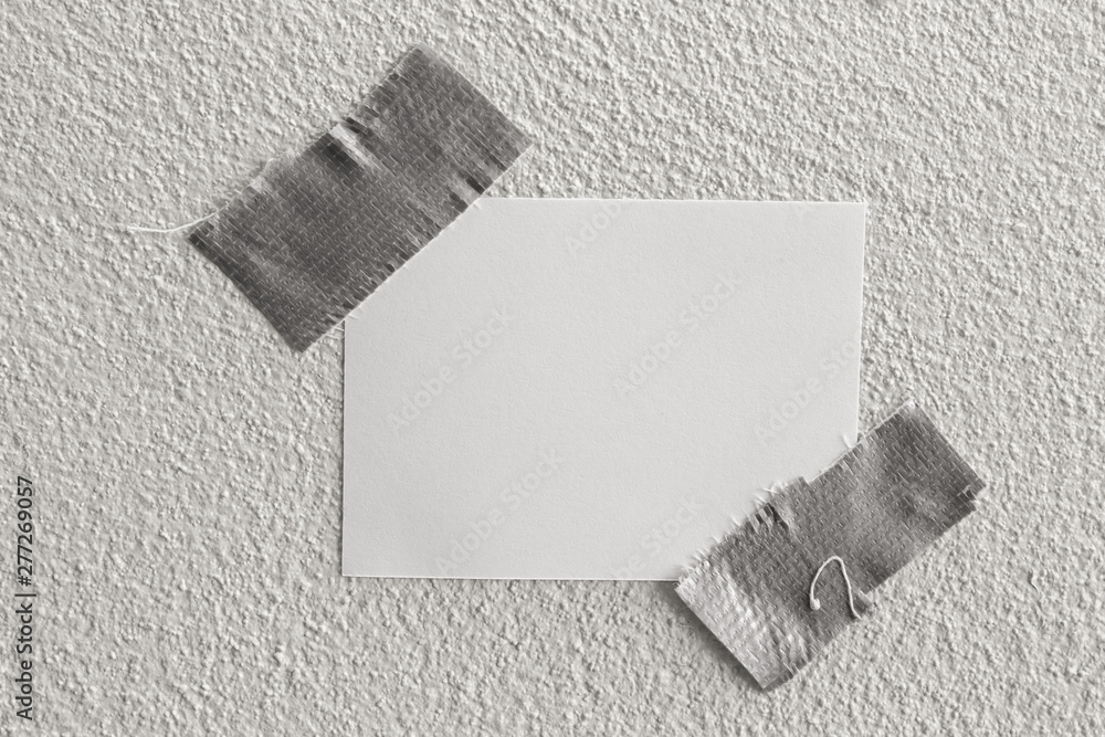 Blank portrait paper. brochure on gray cement wall, changeable ...