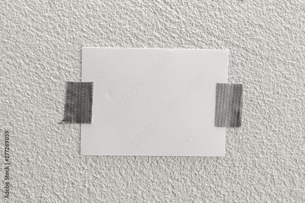Blank portrait paper. brochure on gray cement wall, changeable ...