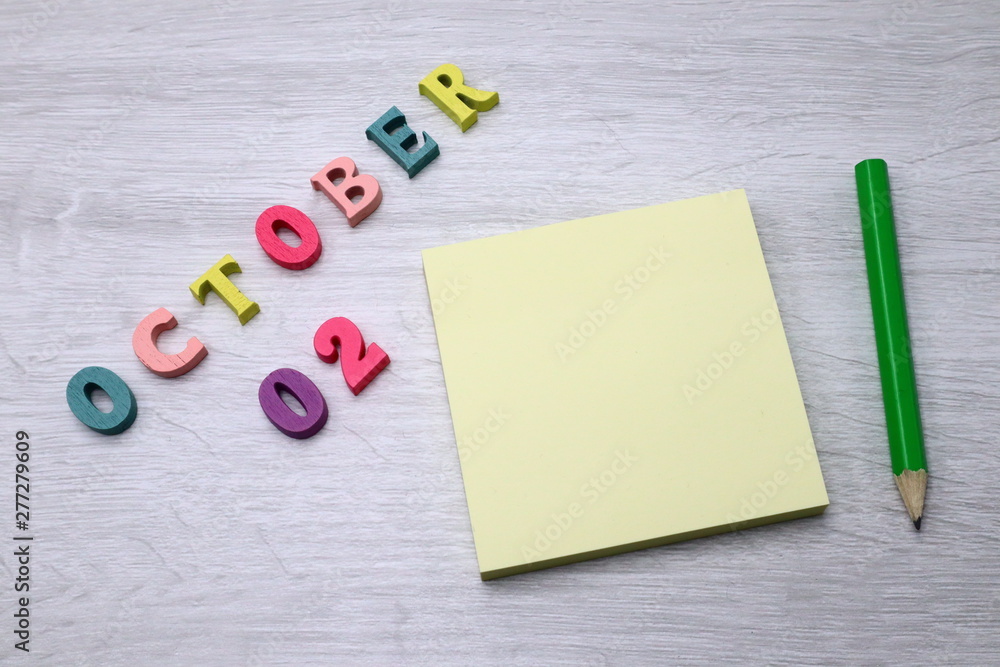 October 2 - Daily colorful Calendar with Block Notes and Pencil on wood ...