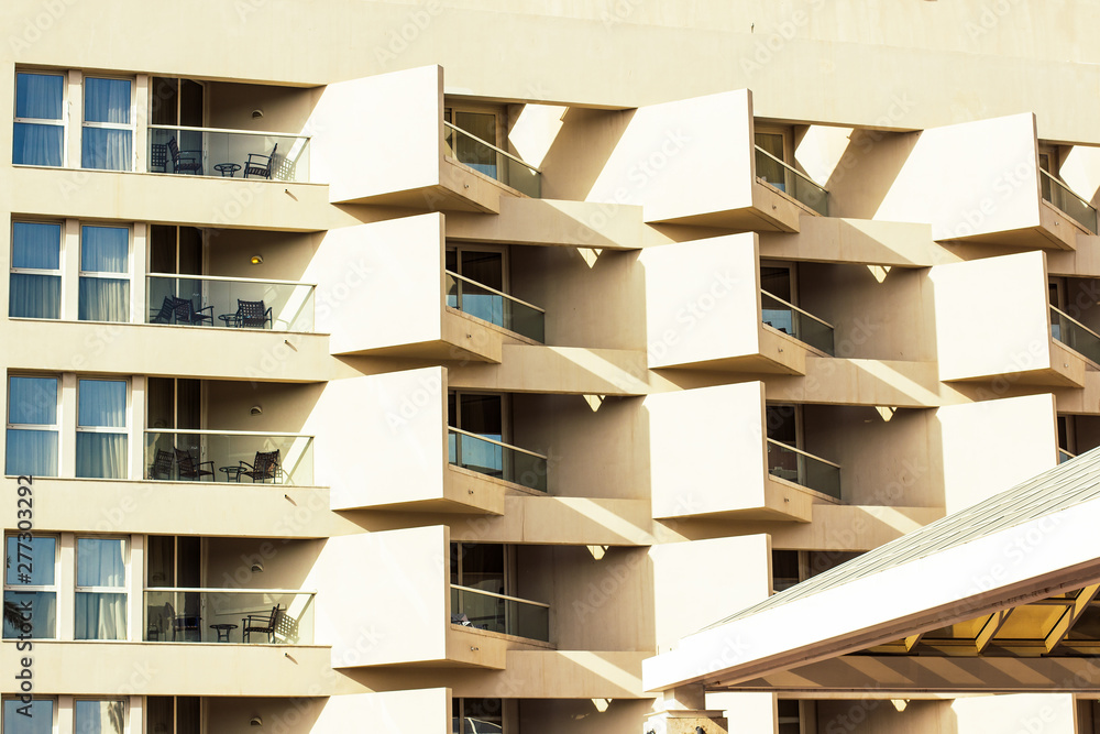 common living building concrete wall balcony and window facade exterior ...