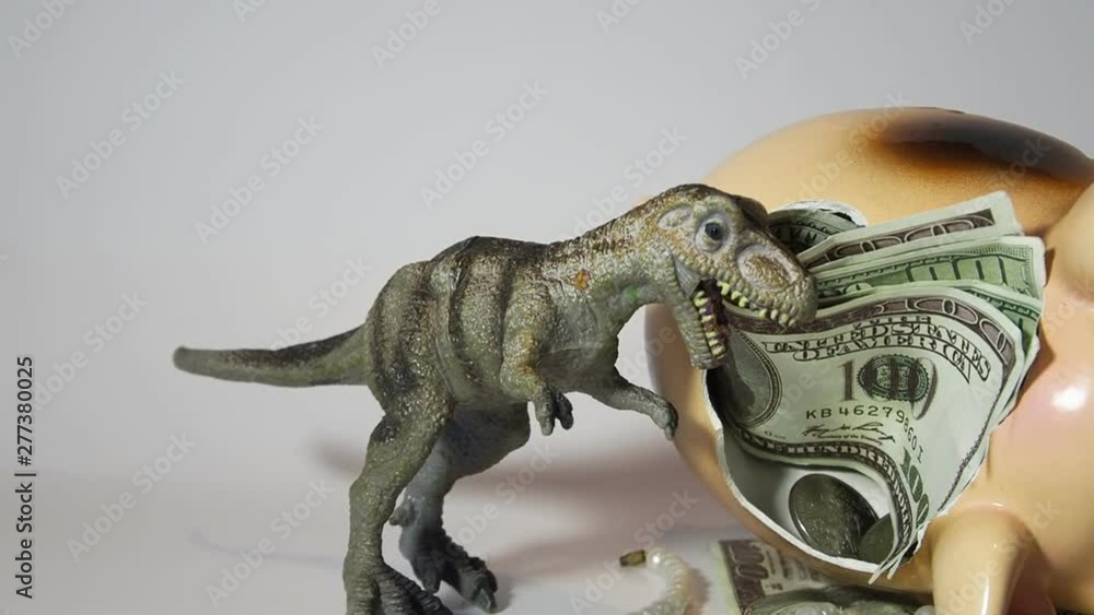 Two carnivorous dinosaurs T Rex and VelociRaptor killed a pig coin box ...