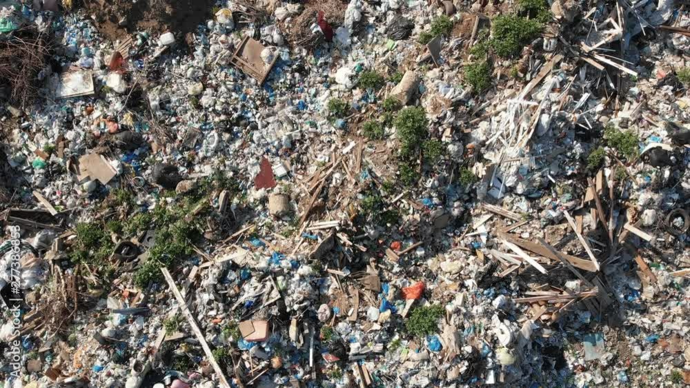 Pollution concept. Garbage pile in trash dump or landfill ...