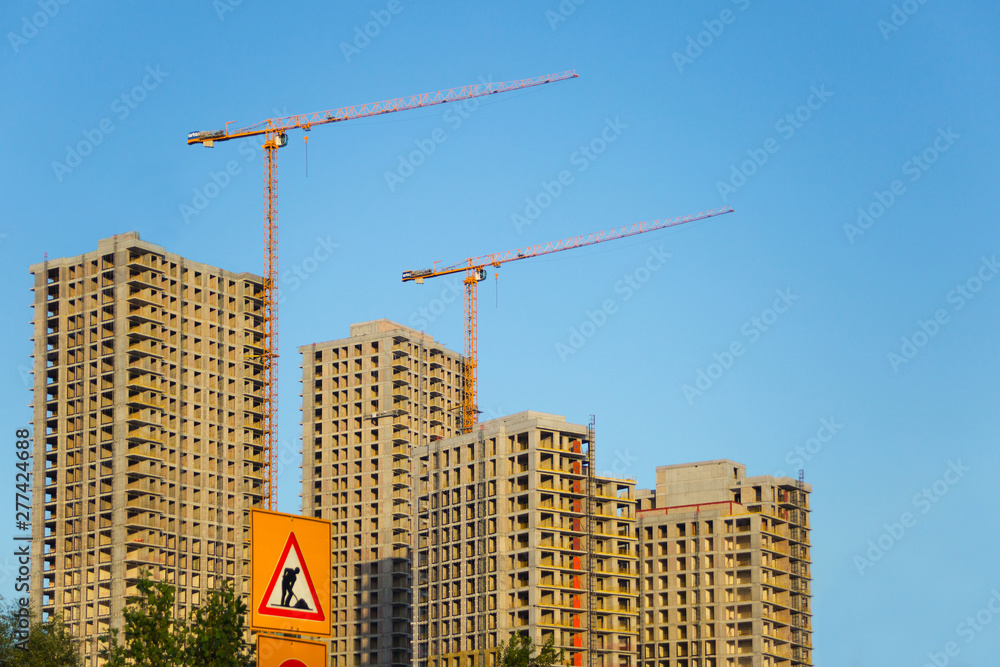 Building Cranes on a Multiple Buildings Construction Site Stock Photo ...