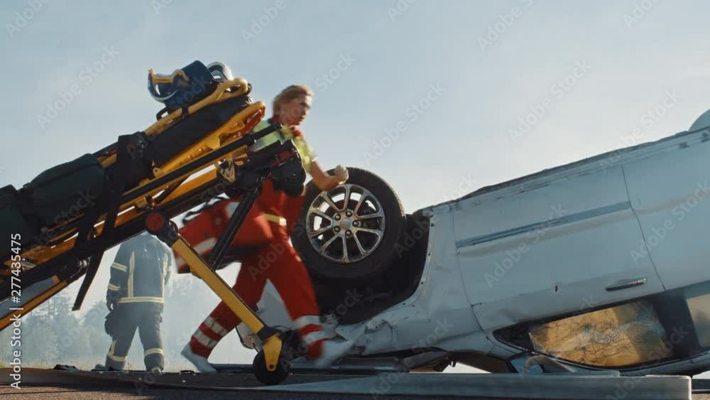 Paramedics Arrive at the Car Crash Traffic Accident Scene. Prepare ...