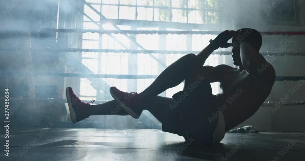 Cinematic shot of a professional young muscular shirtless african man ...