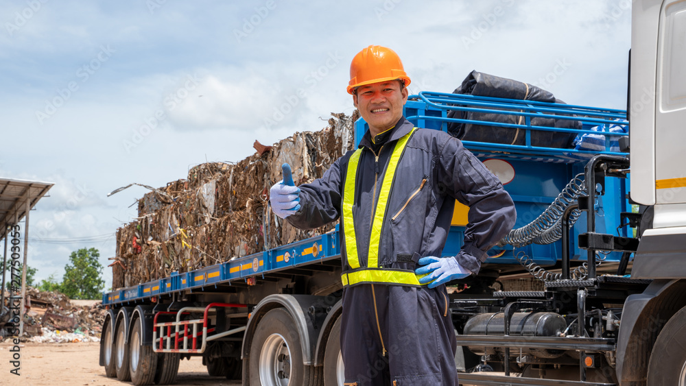 Foreman with safety hats and safety vest is carrying a car inspection ...