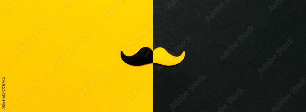 Creative party decoration concept. Black and yellow mustache, props for ...