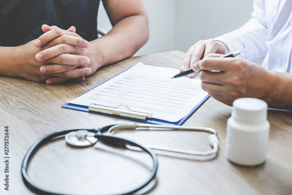 Doctor having conversation with patient while discussing explaining ...