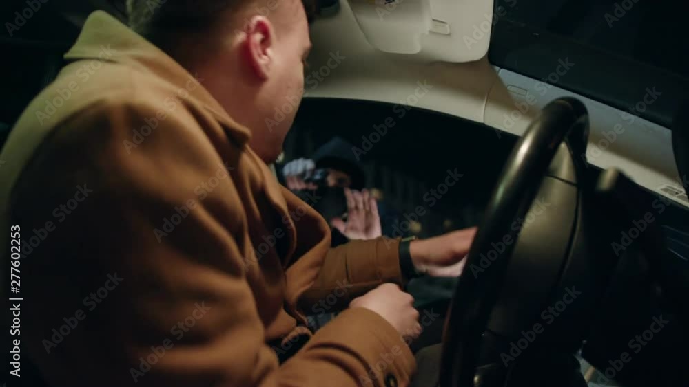 Shot inside in car gangster with gun attacked a man at night street ...