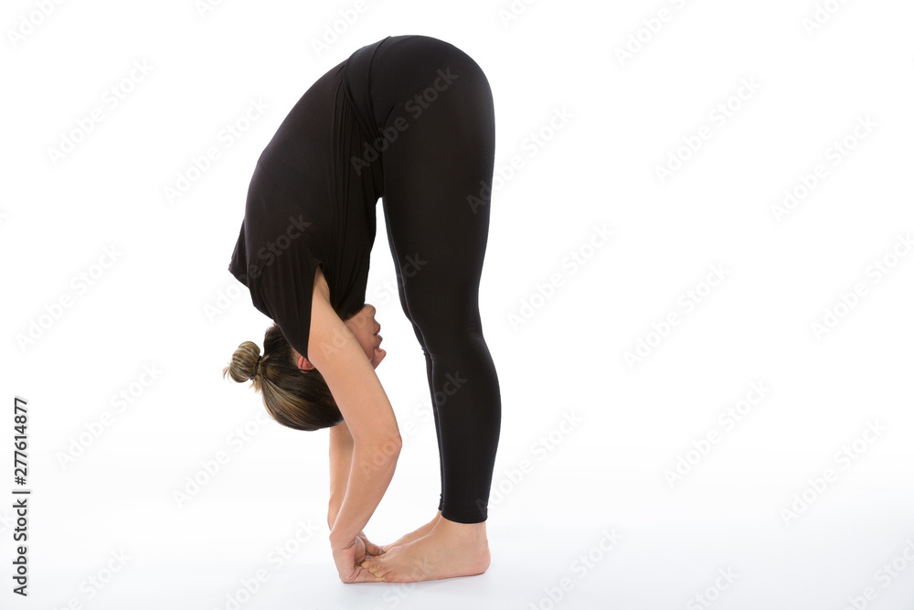 Uttanasana pose (standing forward fold pose). Yoga poses woman isolated ...