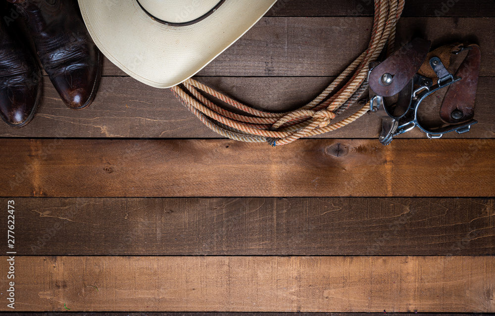 American Cowboy Items incluing a lasso spurs and a traditional straw ...