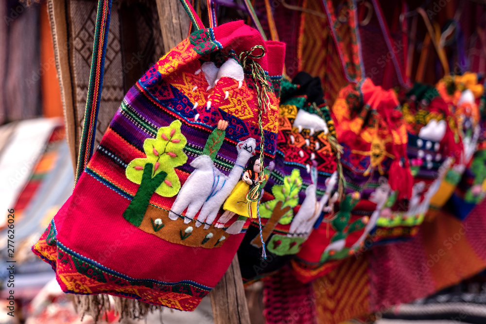 Colorful Peruvian artisanal textiles bag with inca and traditional ...