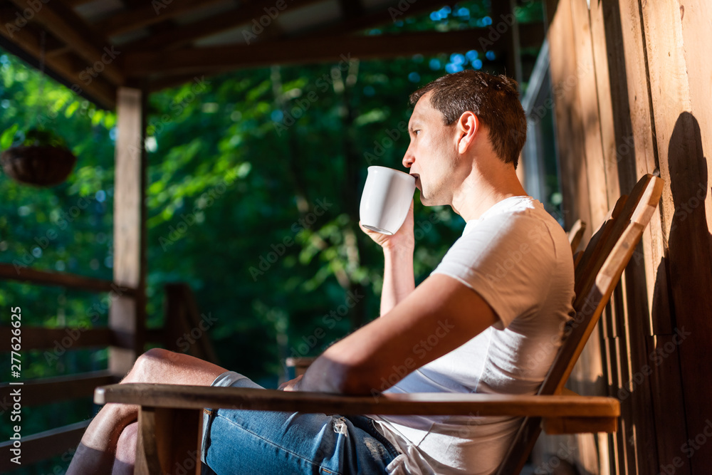 Man On Front Porch Relaxing