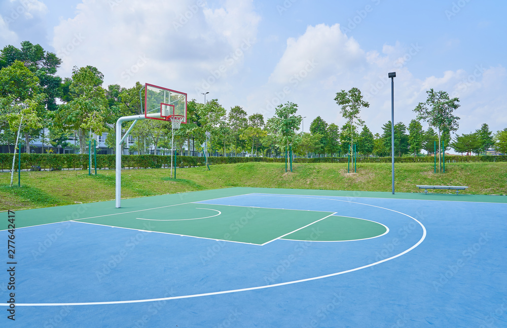 Outdoor open basketball court under sunny sky . Healthy lifestyle sport ...