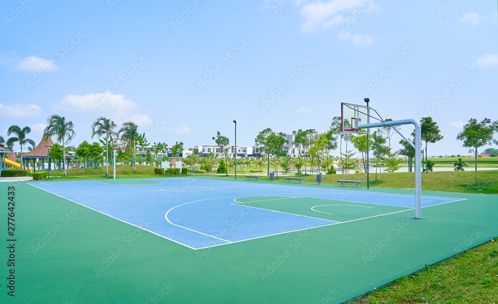 Outdoor open basketball court under sunny sky . Healthy lifestyle sport ...
