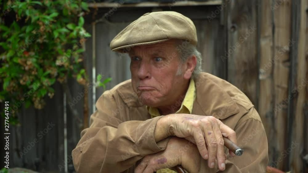 Hilarious funny character old man making faces and pouting. leaning on ...