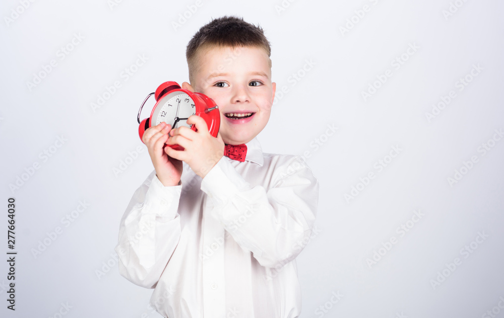 Time management. Morning. little boy with alarm clock. Time to relax ...