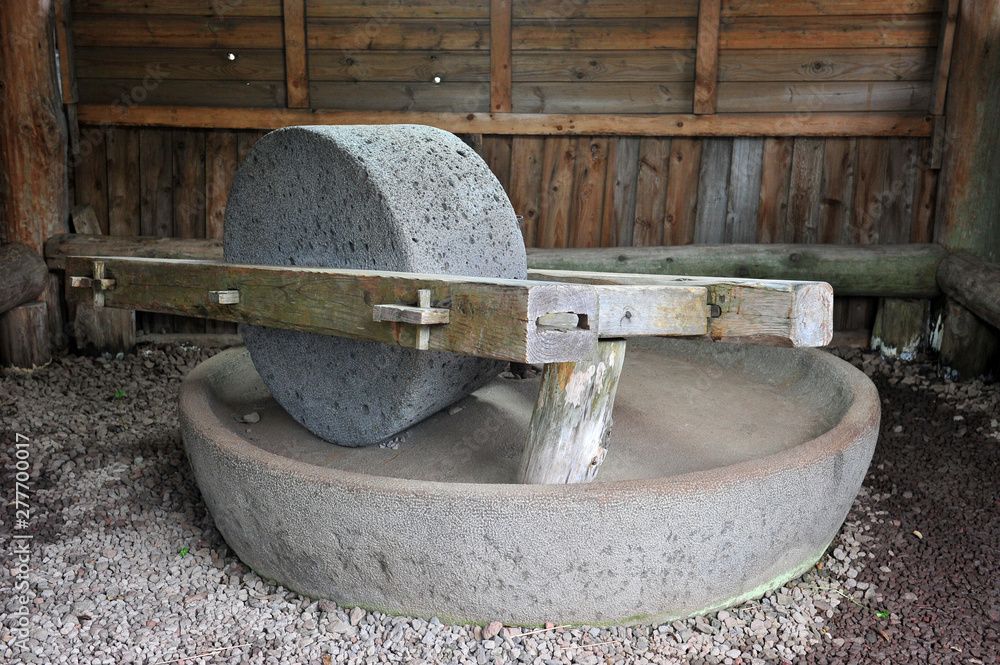 Fotografia do Stock: Molbangae, Millstone worked by horse or ox at the ...