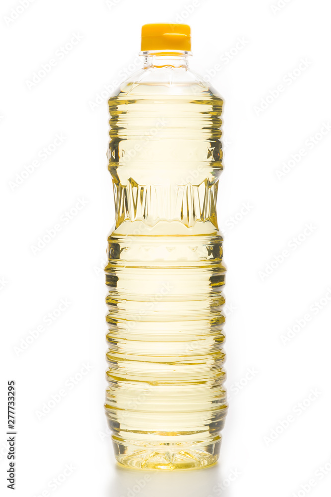 Cooking oil made from soybean have golden color in plastic bottle on ...