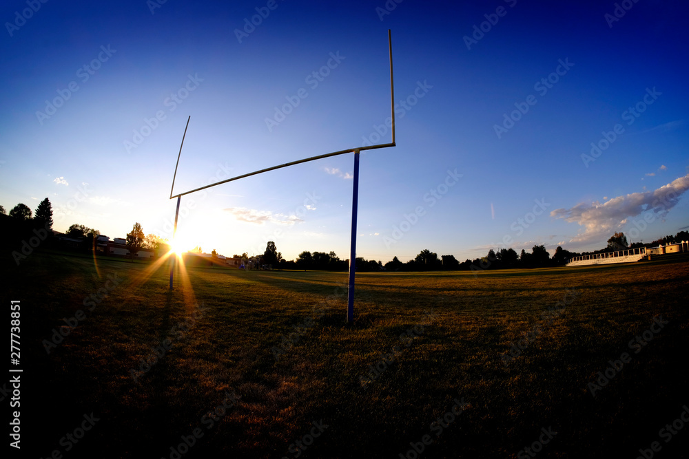 Football Goalposts Goal Posts at Sunset Sky and Bleachers Stock Photo ...