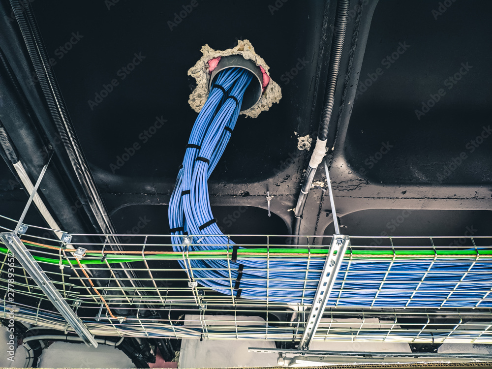 electric trays for electrical and data cabling on site Stock Photo ...
