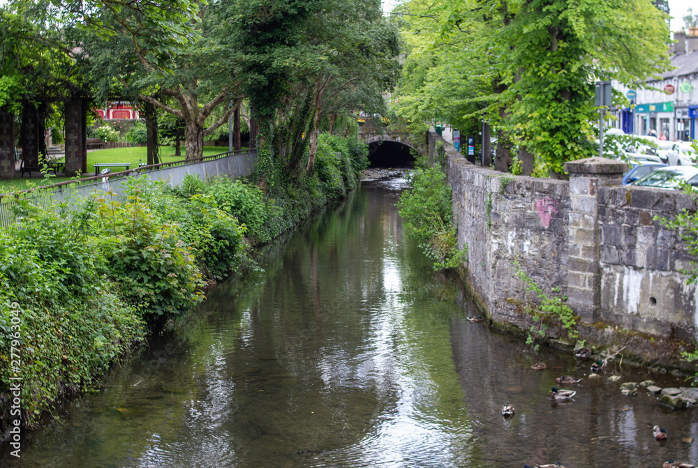 The River Griffeen as it flows through the centre of the village of ...