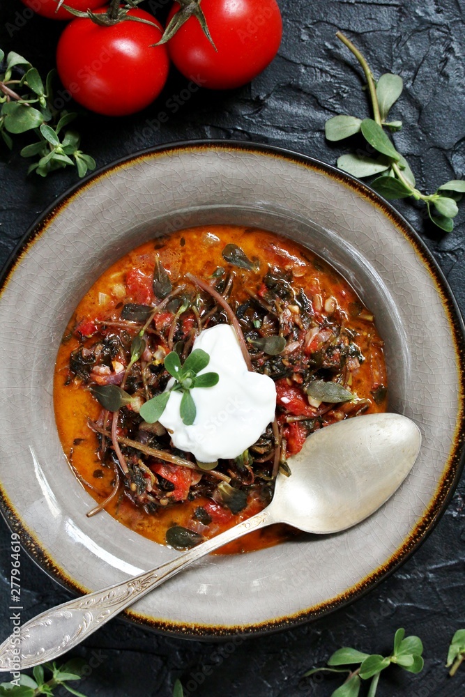 dish of purslane. potulak-edible useful weed. stalks of purslane stewed ...