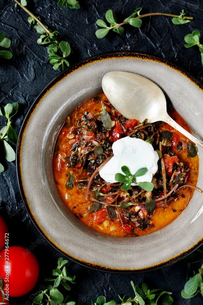 dish of purslane. potulak-edible useful weed. stalks of purslane stewed ...