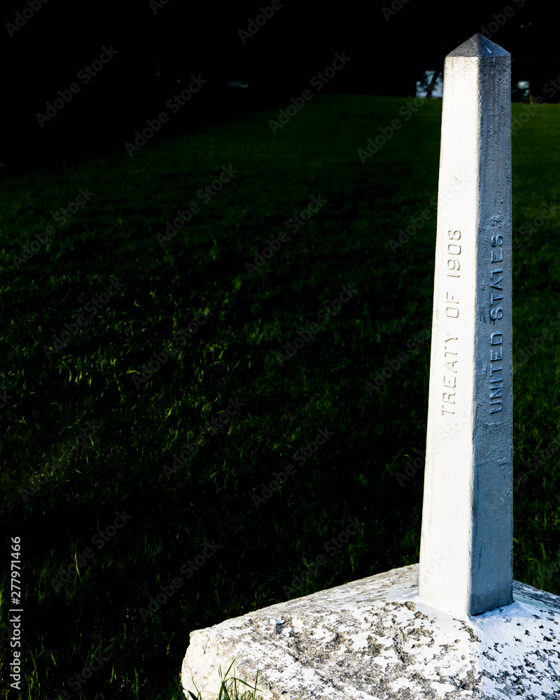 USA Canadian border marker monument with entry prohibited sign Stock ...